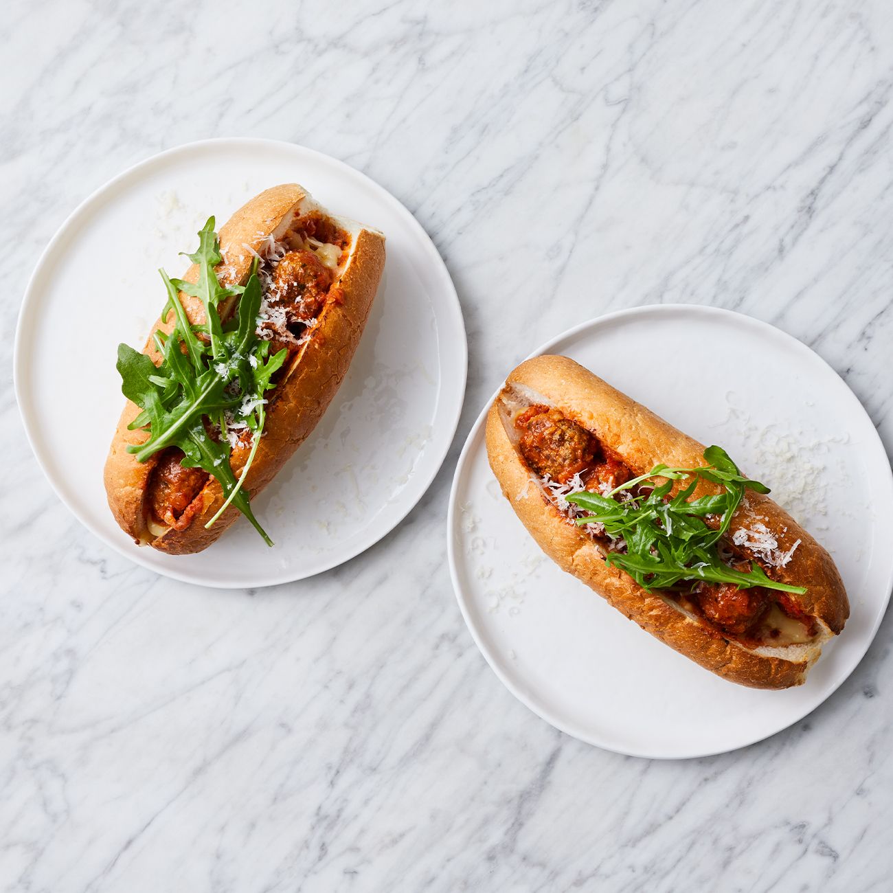 Cheesy Meatball Subs With Rocket Recipe | Woolworths