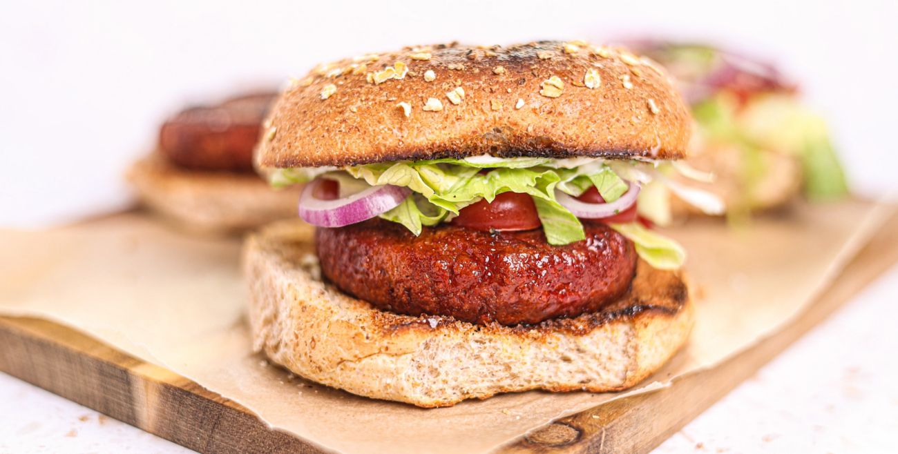 Plant Based 'Beef' Burger with Lettuce Tomato & Onion Recipe | Woolworths