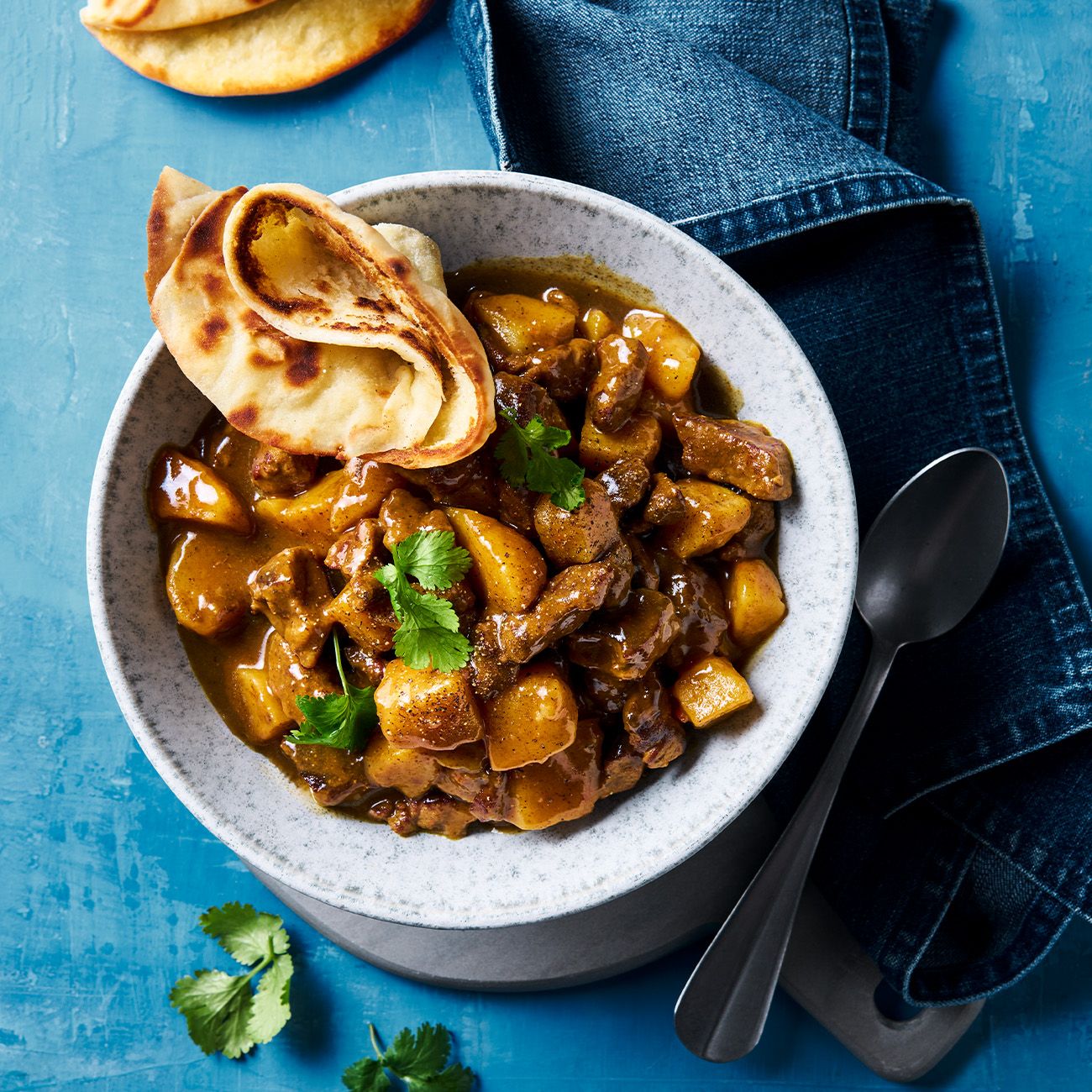 Curry beef with naan Recipe | Woolworths