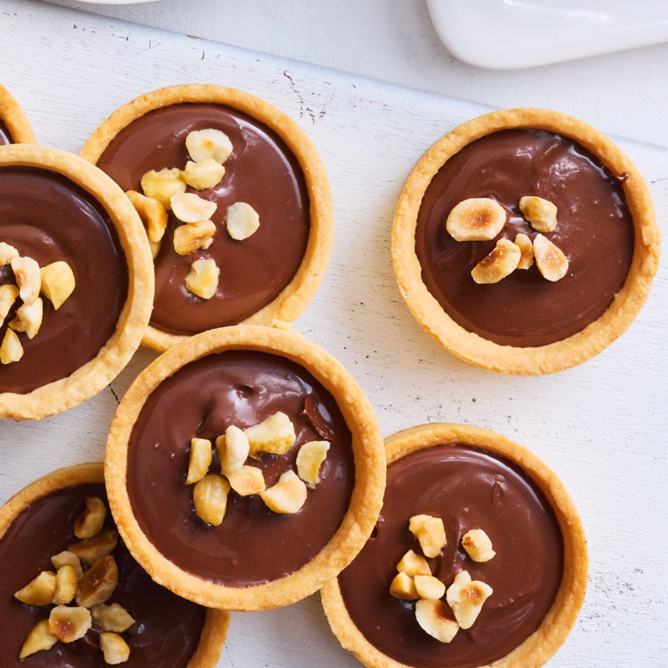 Finish-at-Home Tips for Choc, Hazelnut & Caramel Tarts | Woolworths